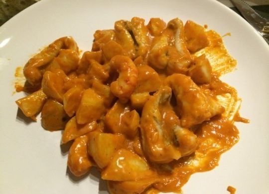 Colas de rape en salsa americana